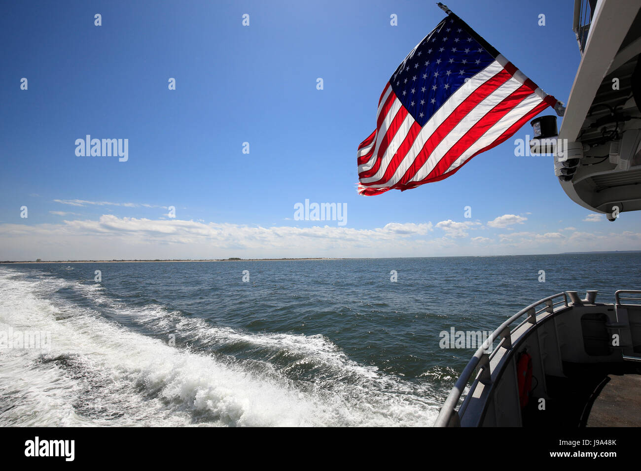 American flag wake boat hi-res stock photography and images - Alamy