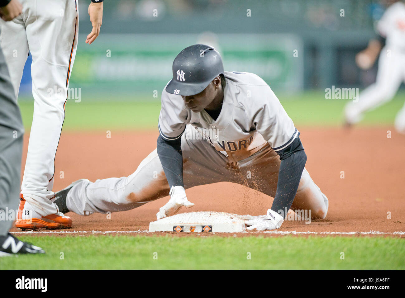 New York Yankees shortstop Didi Gregorius (18) slides into third on a ...