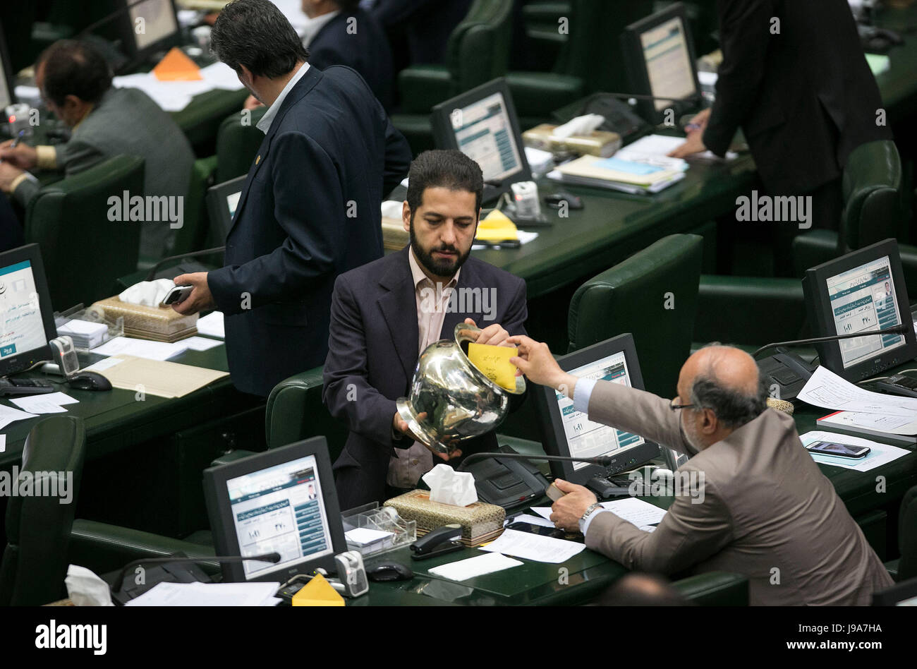 Tehran, Iran. 31st May, 2017. An Iranian lawmaker votes at Iranian ...
