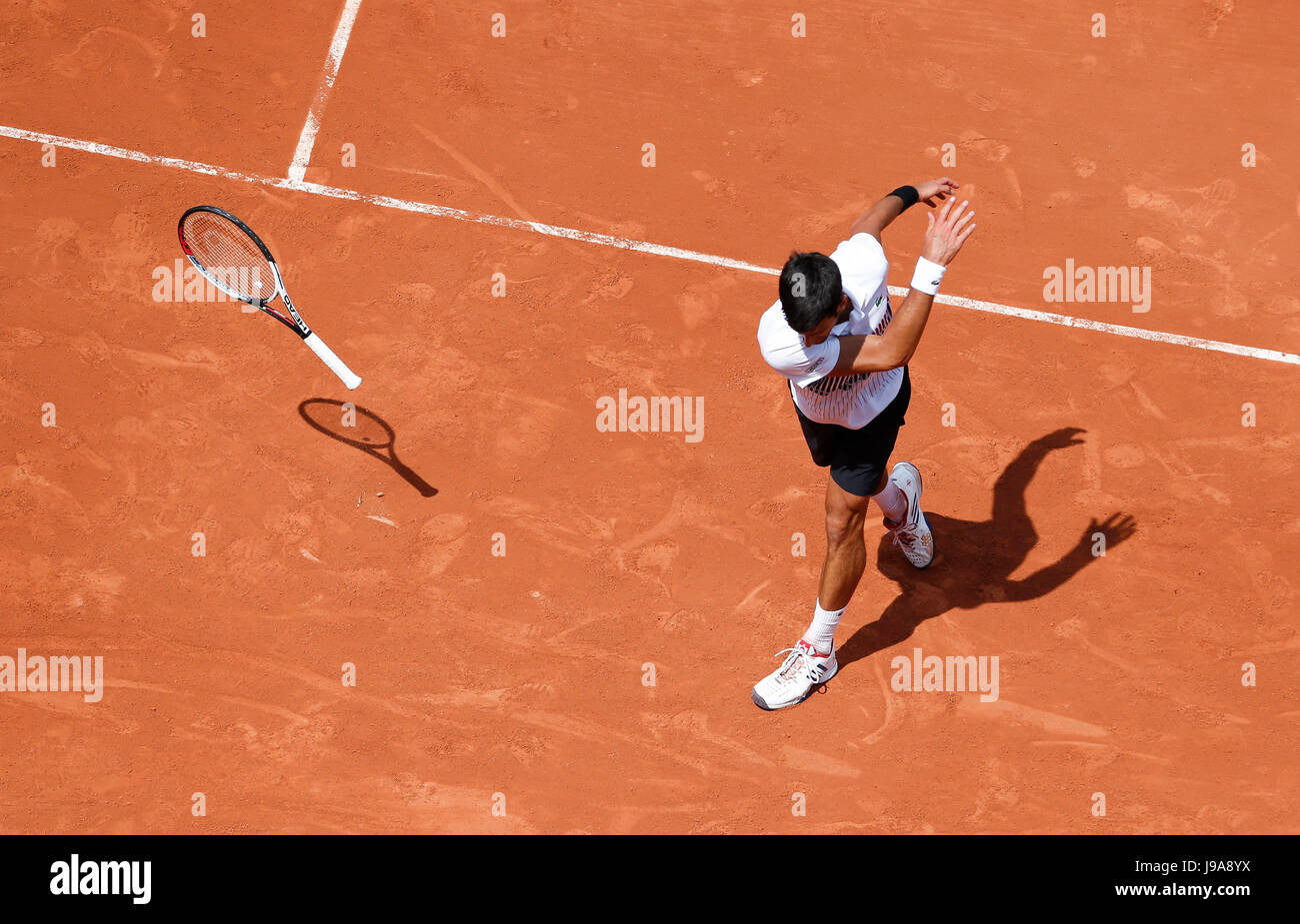 Paris, France. 31st May, 2017. Novak Djokovic of Serbia throws his ...