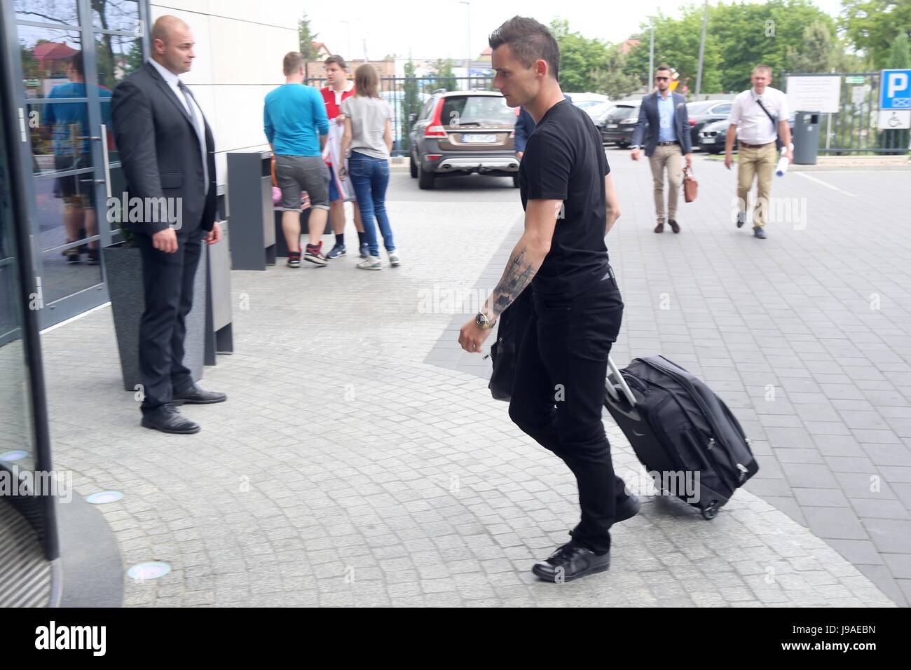 KRZYSZTOF MACZYNSKI arrives at a gathering before the match vs. Romania ...