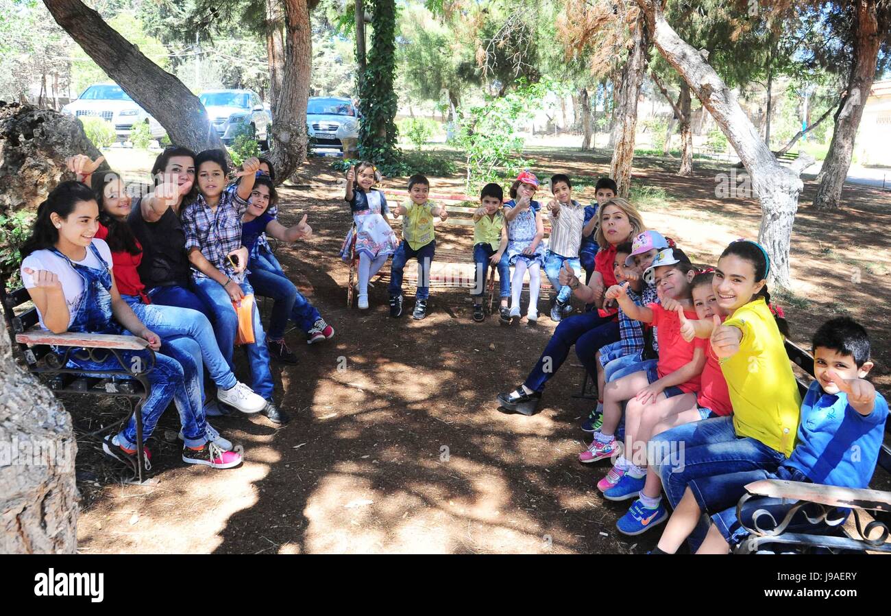 Children with mother syria hi-res stock photography and images - Alamy