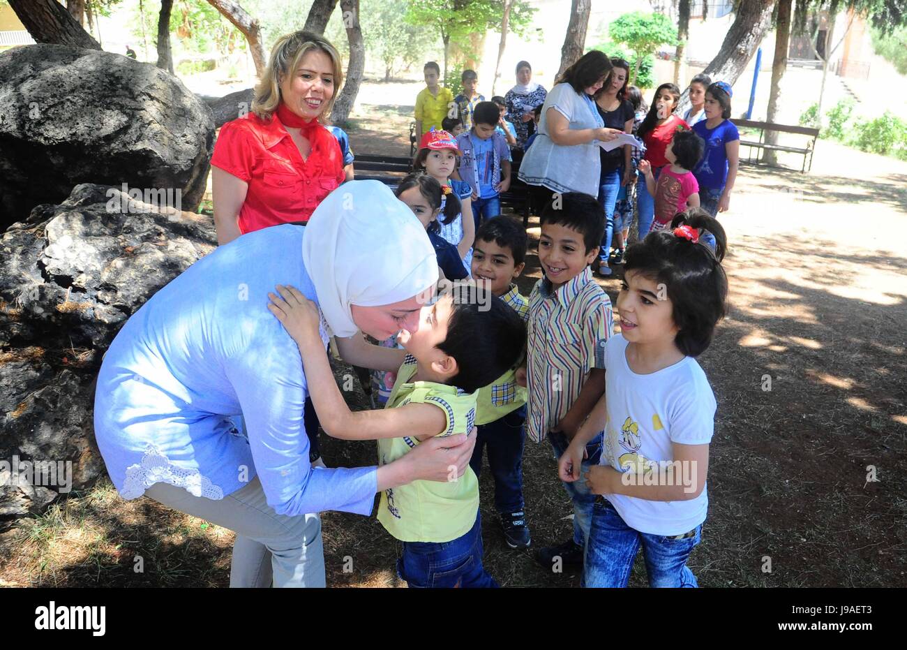 Children with mother syria hi-res stock photography and images - Alamy