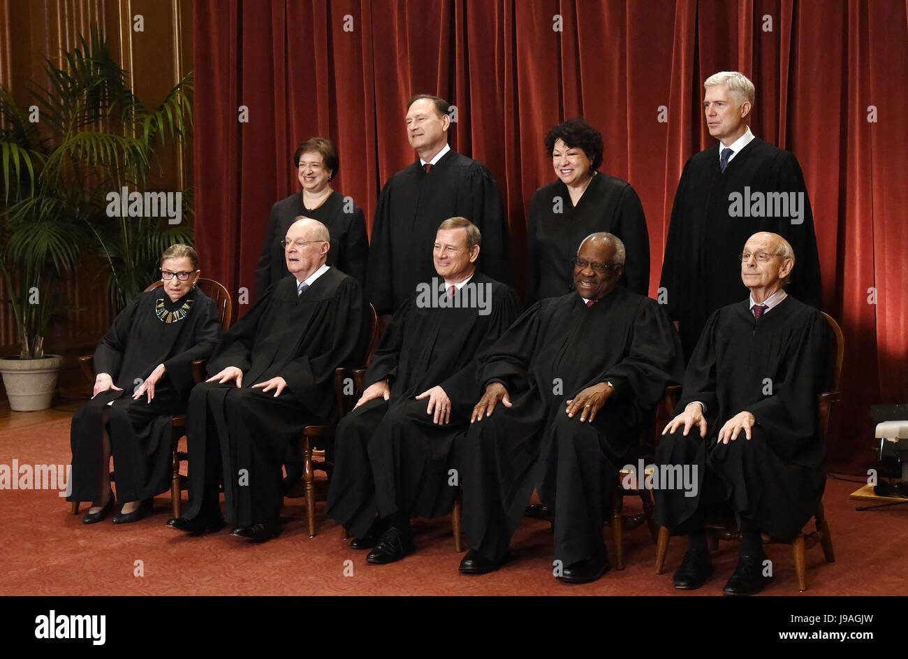 Members of the US Supreme Court pose for a group photograph at the ...