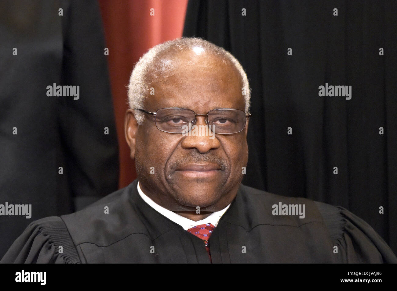 Associate Justice Clarence Thomas poses for a group photograph at the ...