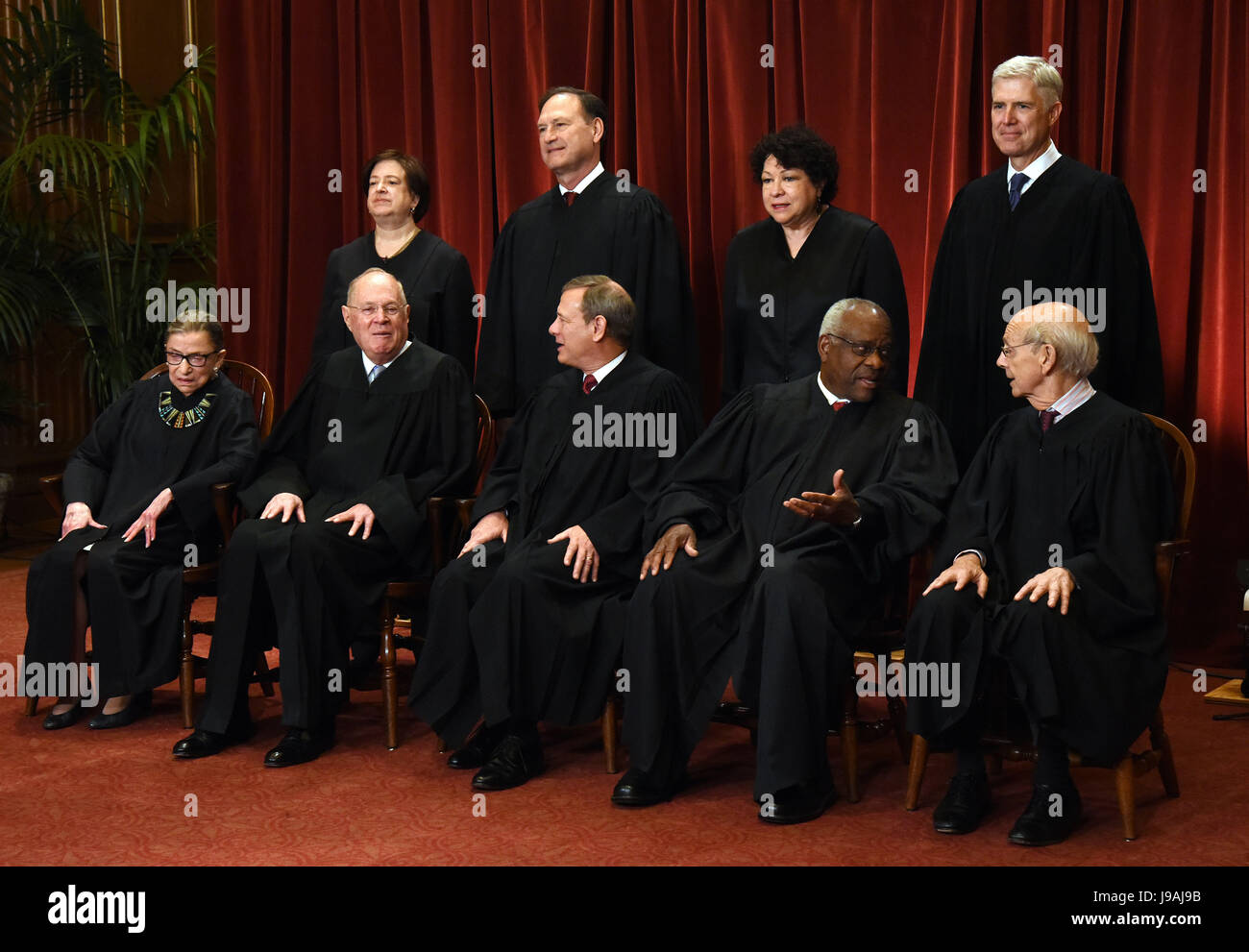 Members of the US Supreme Court pose for a group photograph at the ...