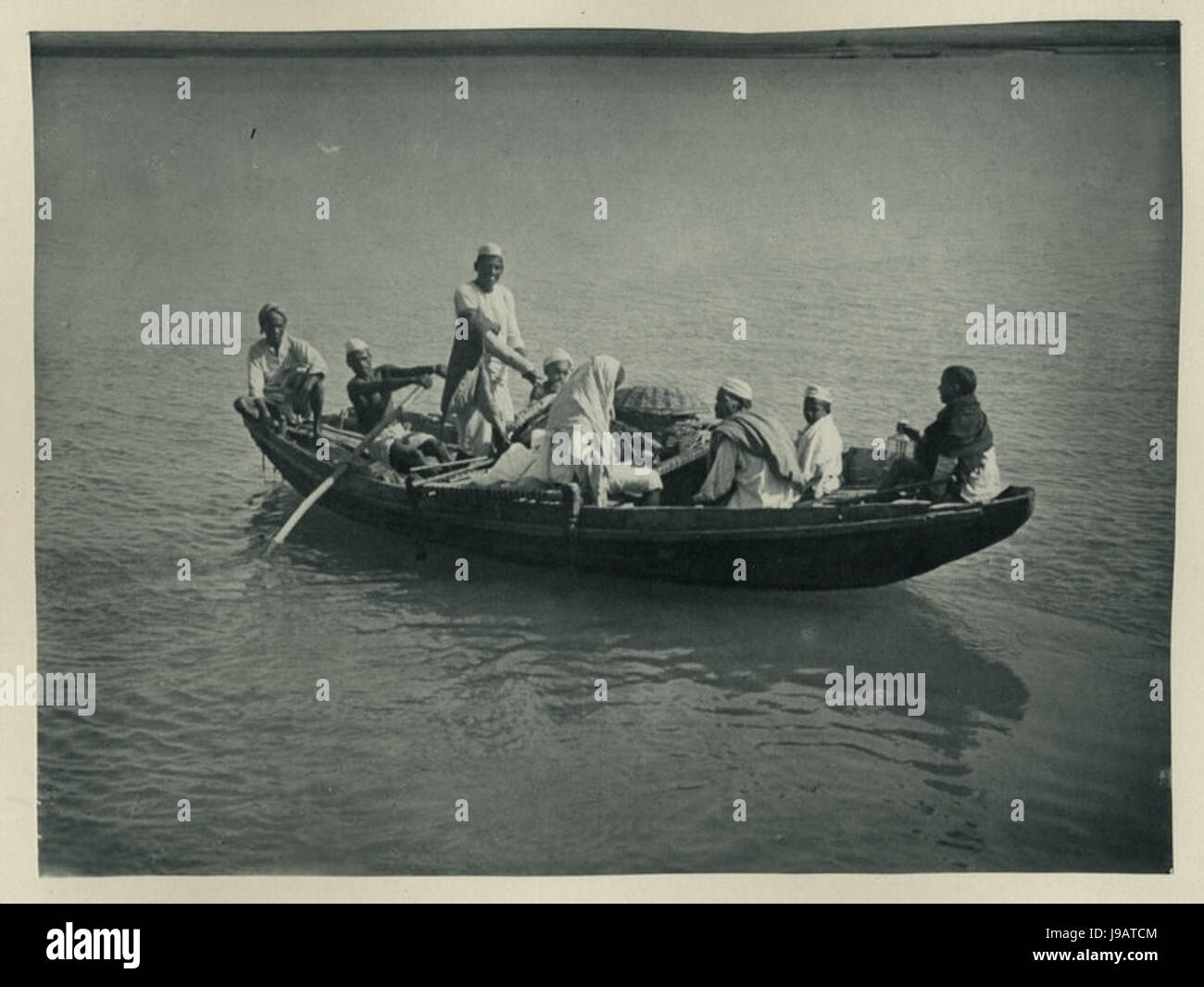 People on small ferry boat in India (c. 1900 Stock Photo - Alamy