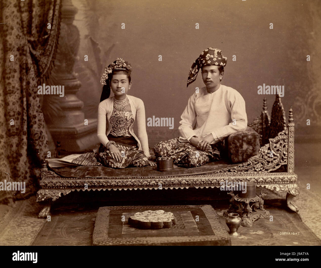Upper class Burmese couple in the 1890s Stock Photo - Alamy