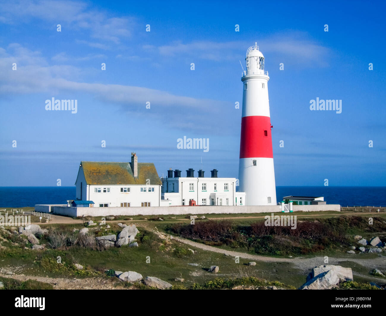 The red and white lighthouse on the Isle of Portland, Dorset, England ...