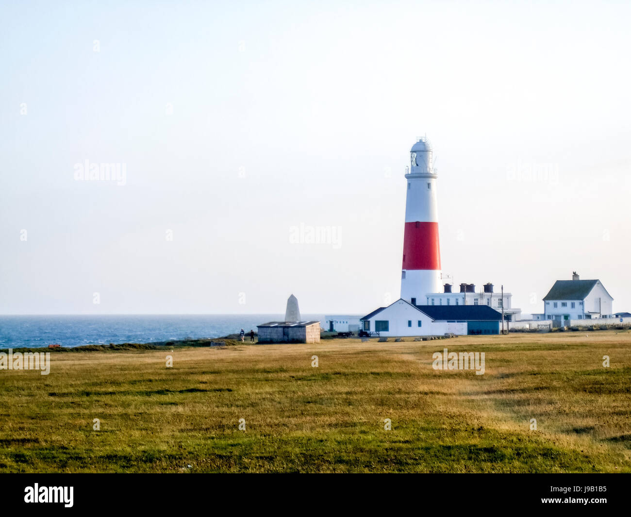 The red and white lighthouse on the Isle of Portland, Dorset, England ...