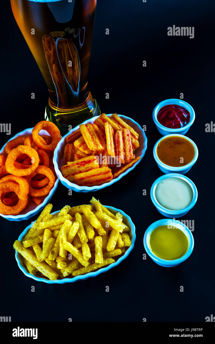 Set of snacks with dip and pint of beer, crunchy snacks, good food ...