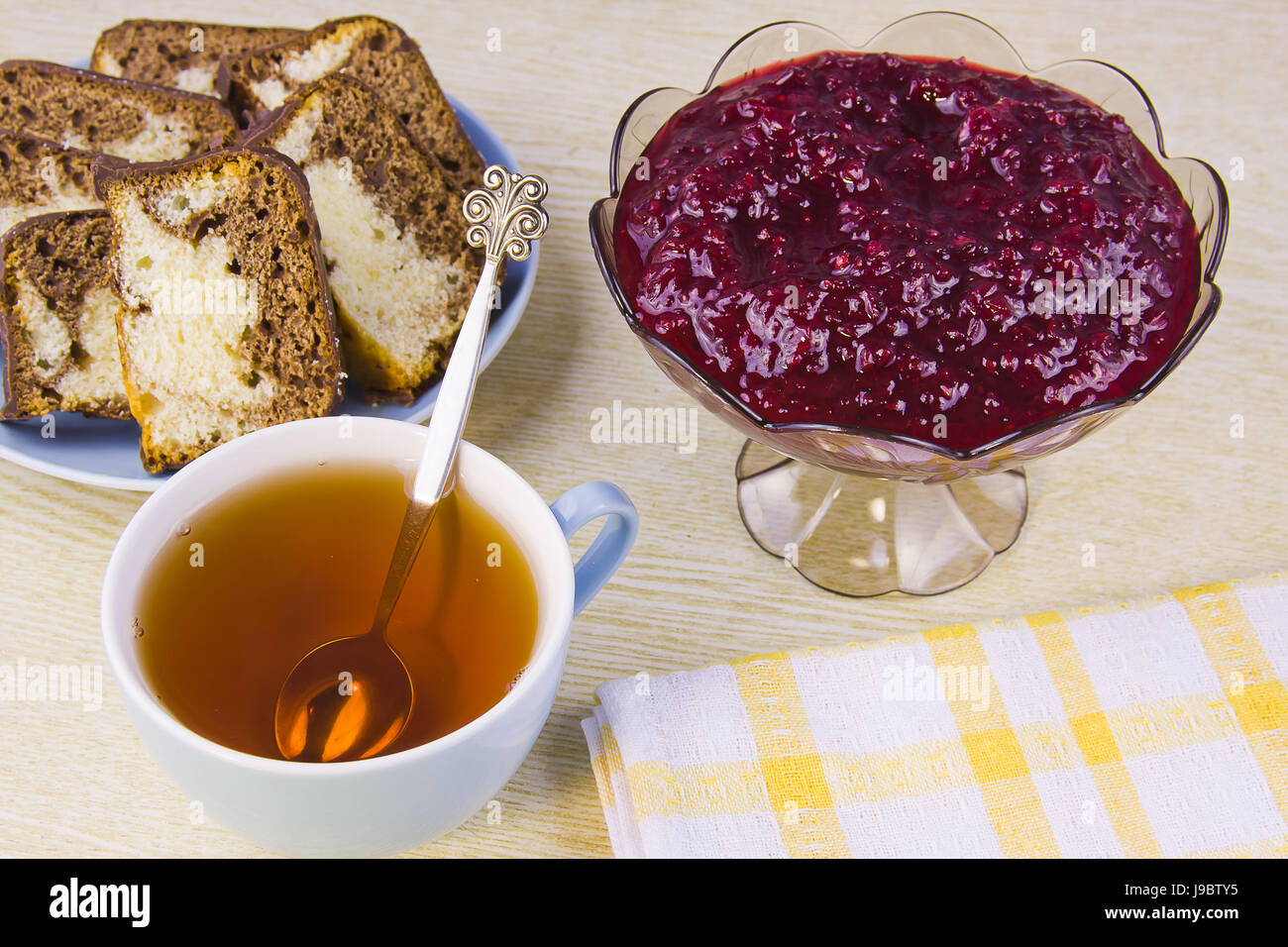 cooking from a red currant, sweet cakes and cup with tea Stock Photo ...