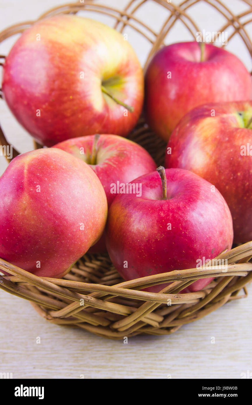 fruit large red ripe apples in a ped Stock Photo - Alamy