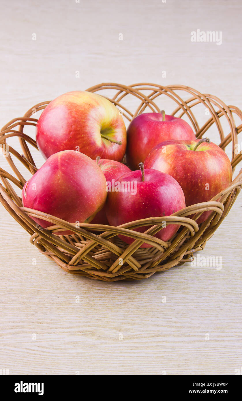 fruit large red ripe apples in a ped Stock Photo - Alamy