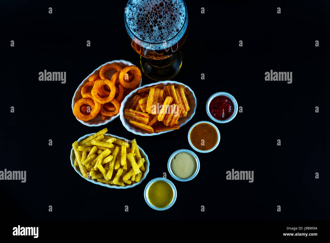 Set of snacks with dip and pint of beer, crunchy snacks, good food ...