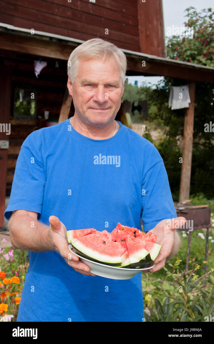 Man smiling melons hi-res stock photography and images - Alamy