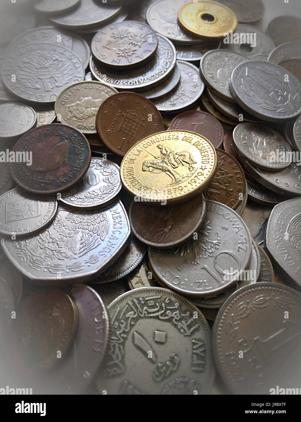 Multiple International Coins Stock Photo - Alamy