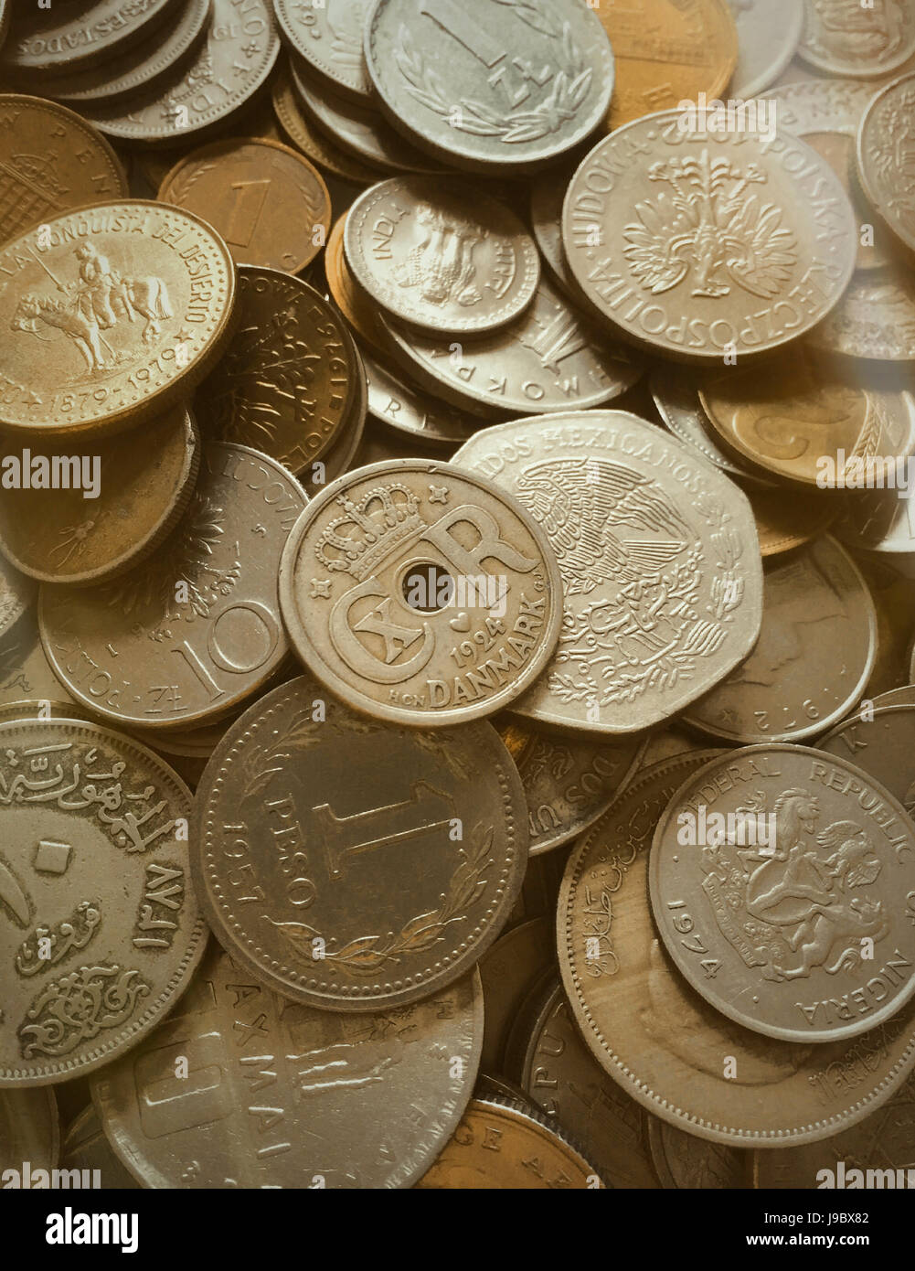 Multiple International Coins Stock Photo - Alamy
