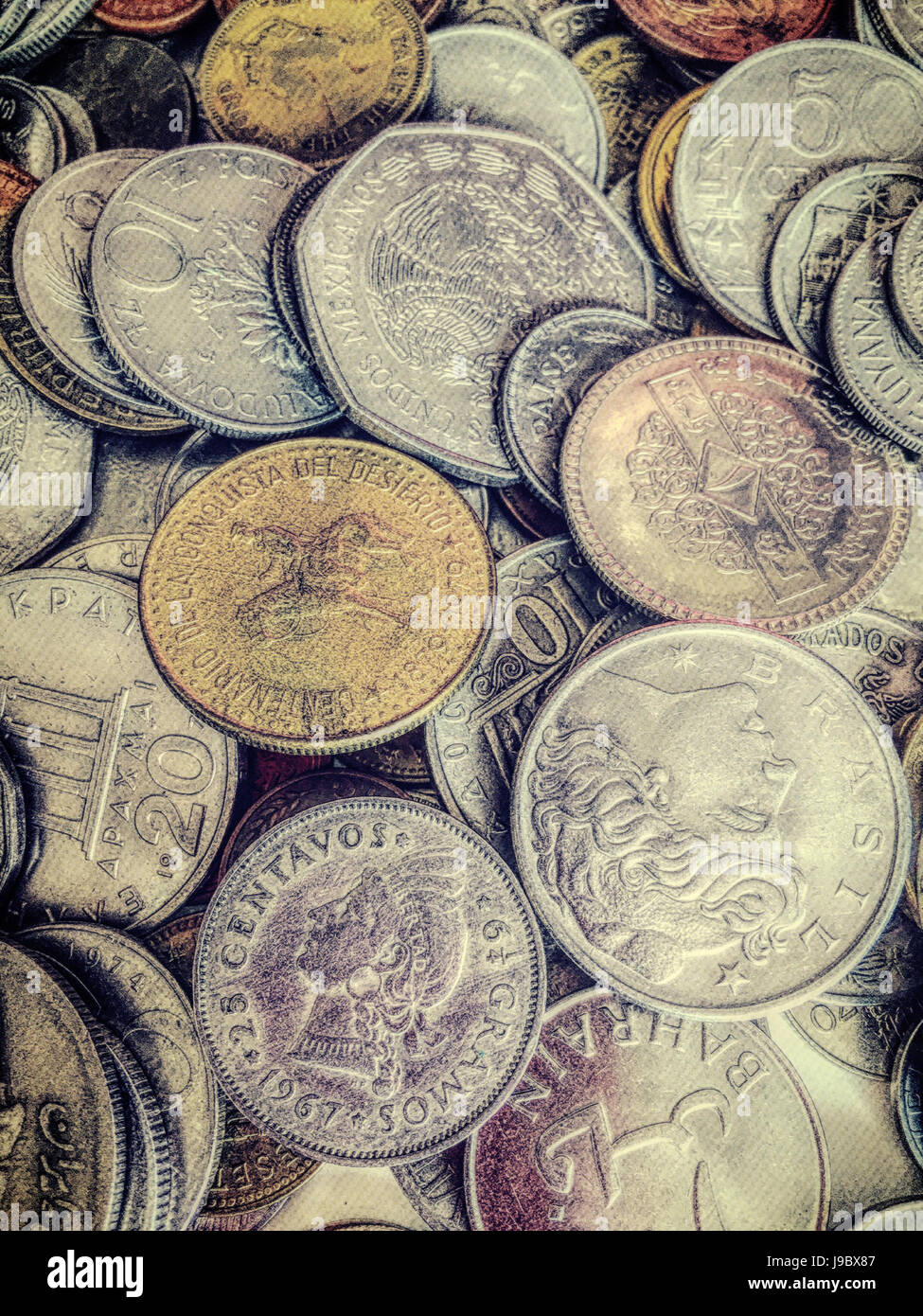 Multiple International Coins Stock Photo - Alamy