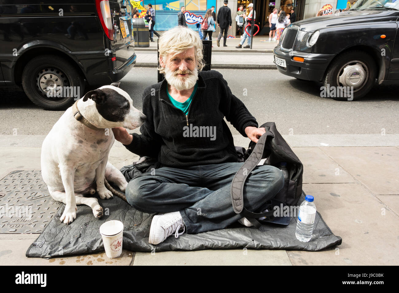 A homeless man and his trusty dog on Oxford Street Stock Photo - Alamy