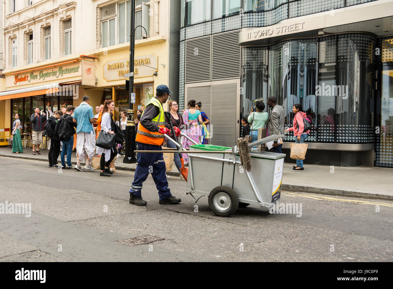 Devotees dancing and singing outside the Radha-Krishna Temple in Soho ...