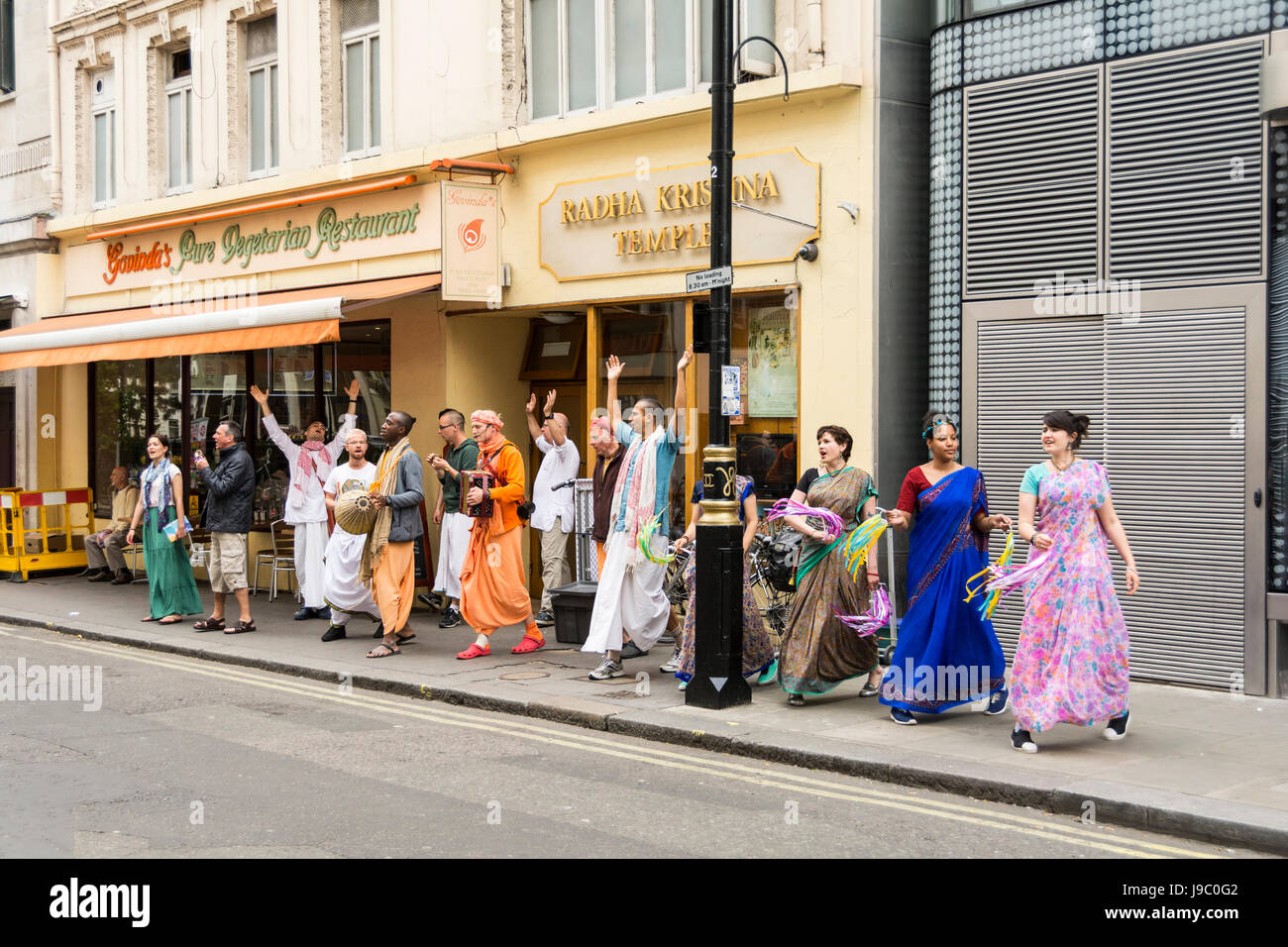 Devotees dancing and singing outside the Radha-Krishna Temple in Soho ...