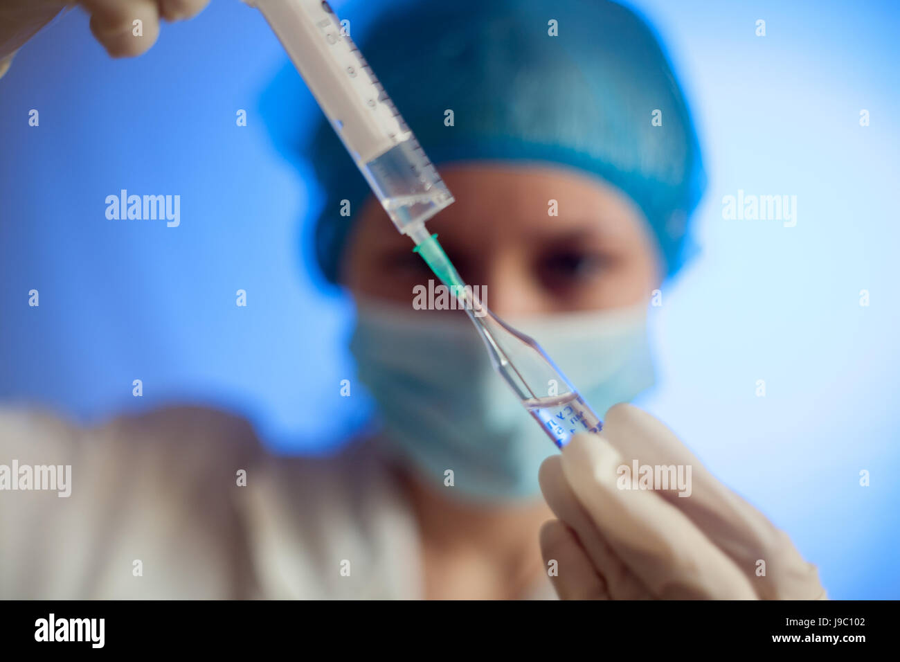 Syringe, medical injection in hand, palm or fingers. Medicine plastic ...