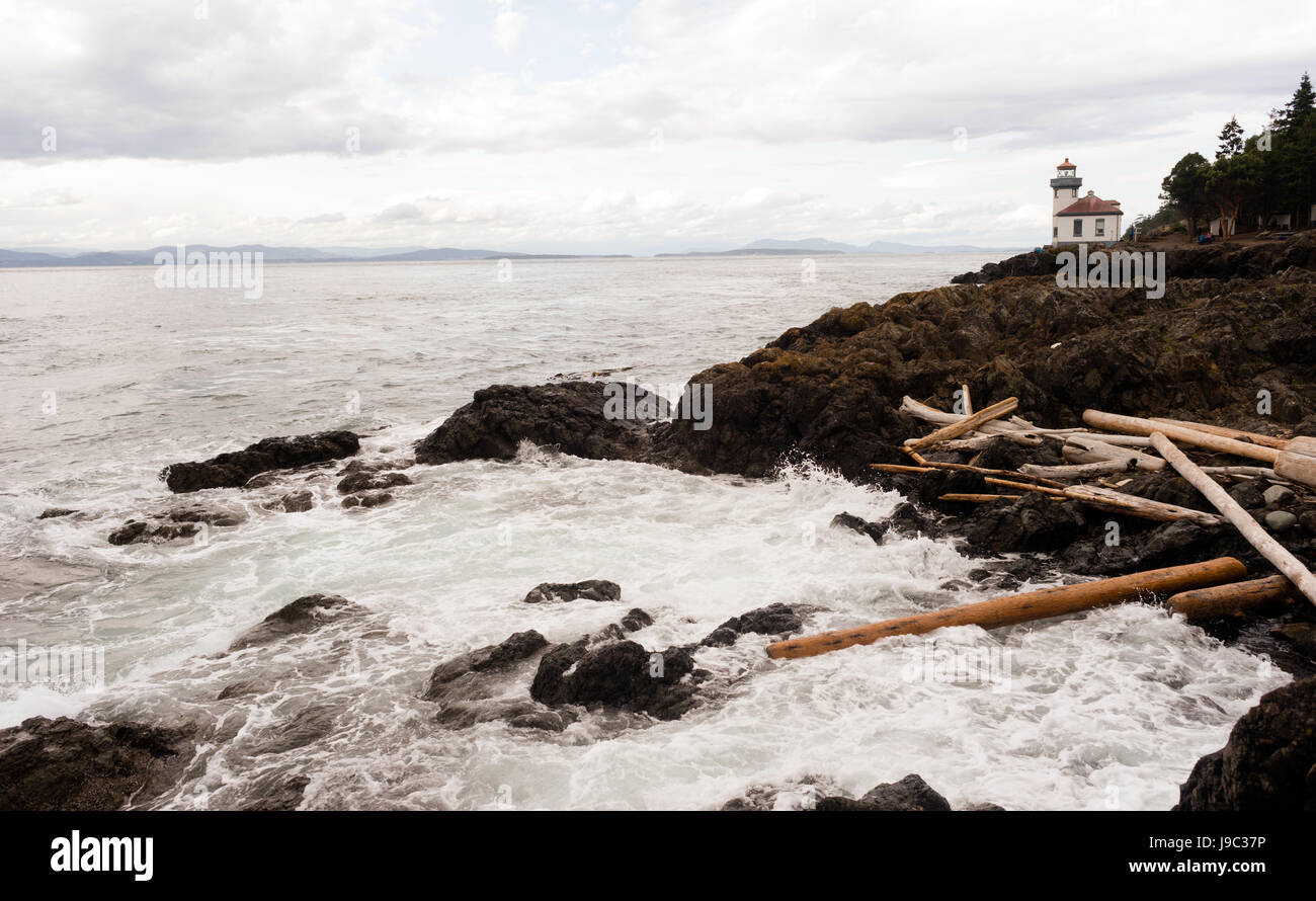 Waves crash up onto the rocks from the Pacific Ocean at this coastal ...