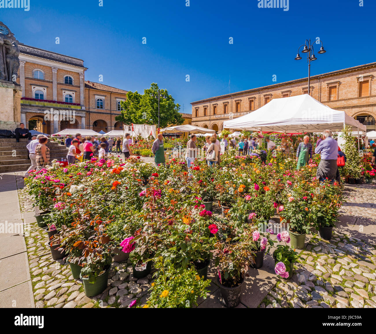 Flower fair in medieval village in Italy Stock Photo - Alamy