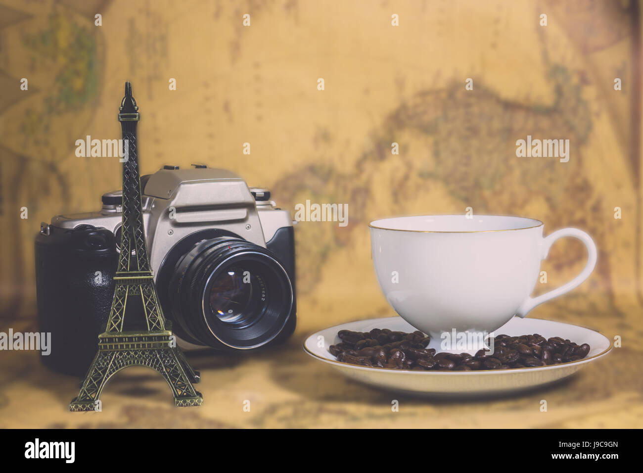 Coffee cup camera on the map Stock Photo - Alamy