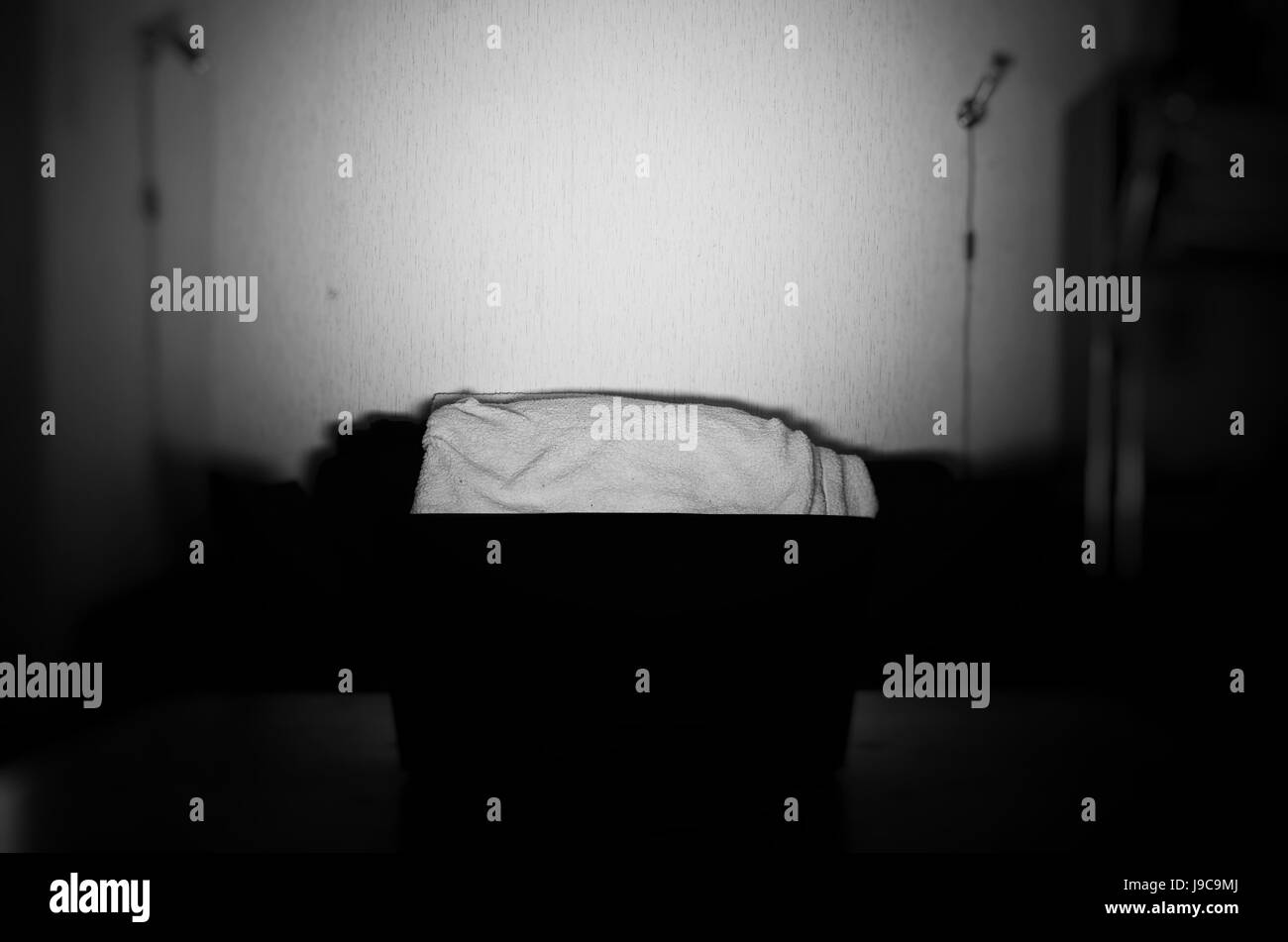 Computer screen illuminating room at night Stock Photo - Alamy