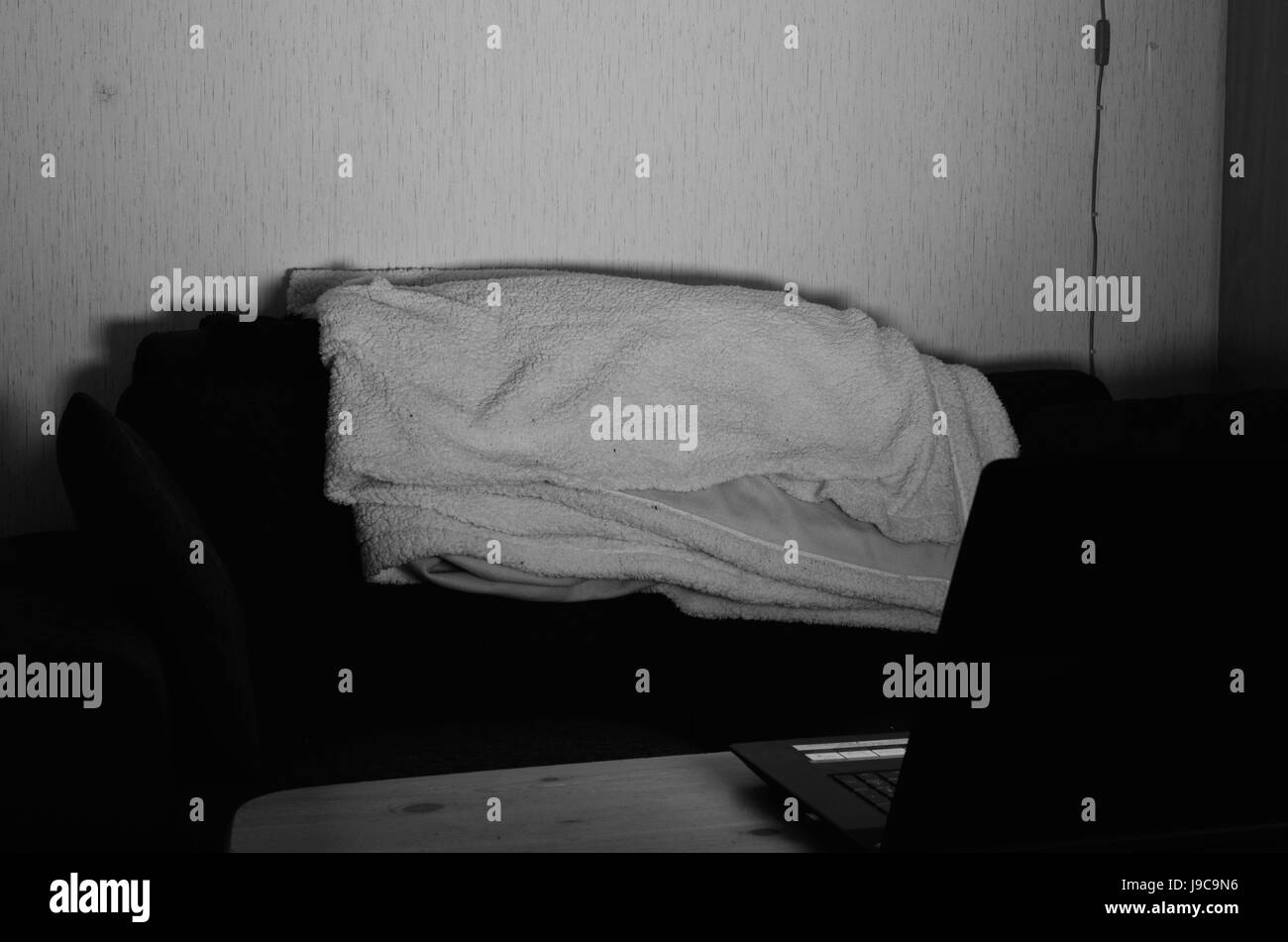 Computer screen illuminating room at night Stock Photo - Alamy