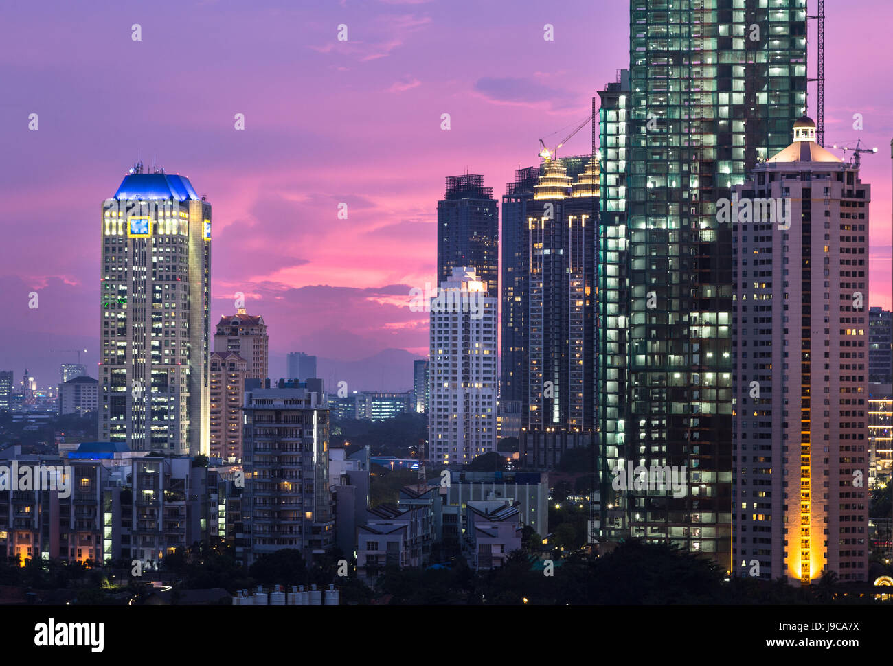 Sunset over Jakarta South Central Business district, with bank towers ...