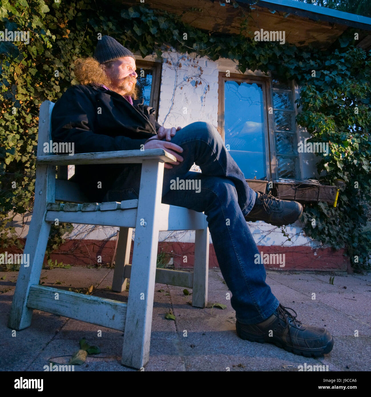 man on the chair Stock Photo - Alamy