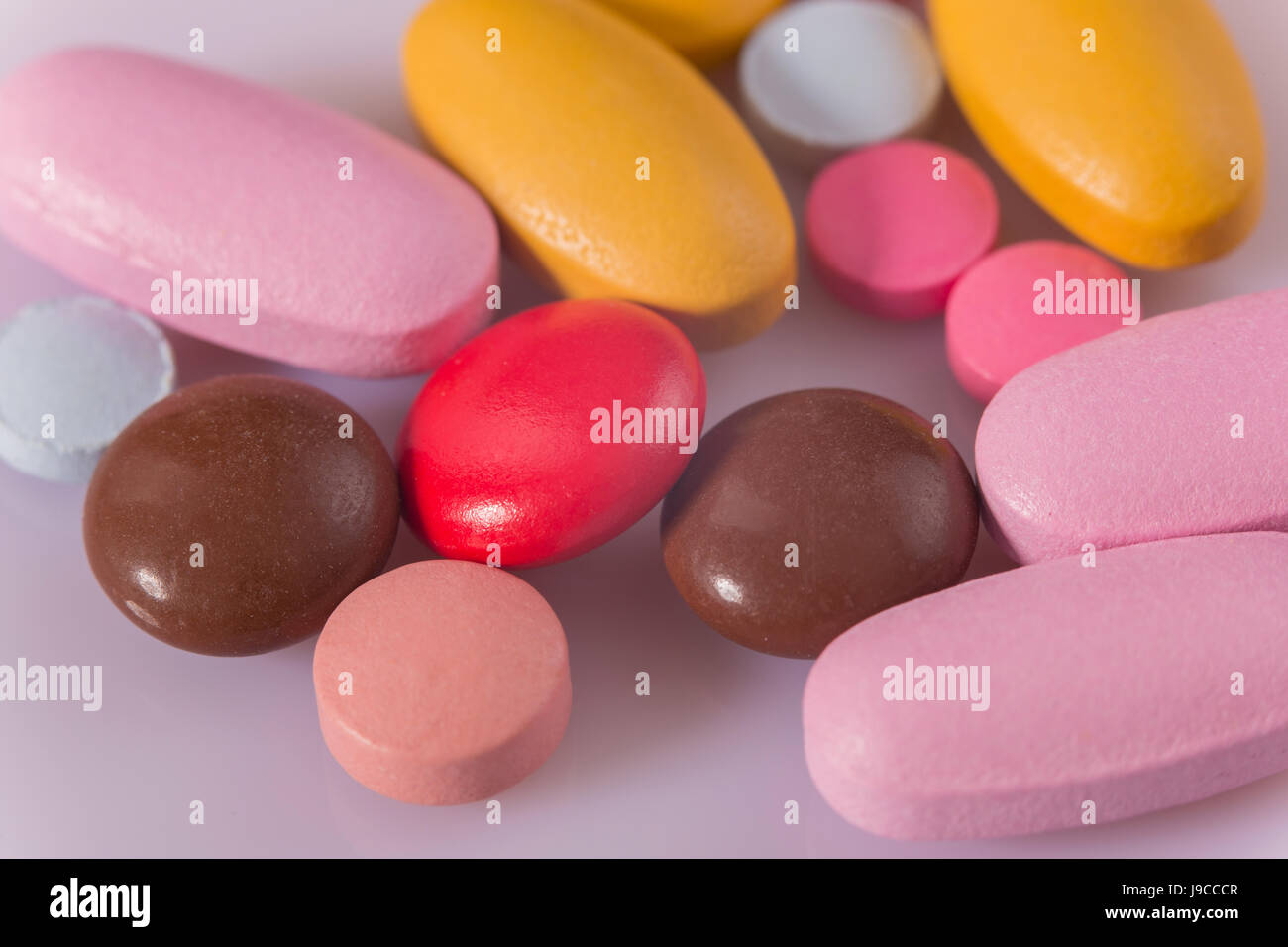 different Tablets pills capsule heap mix therapy drugs Stock Photo - Alamy