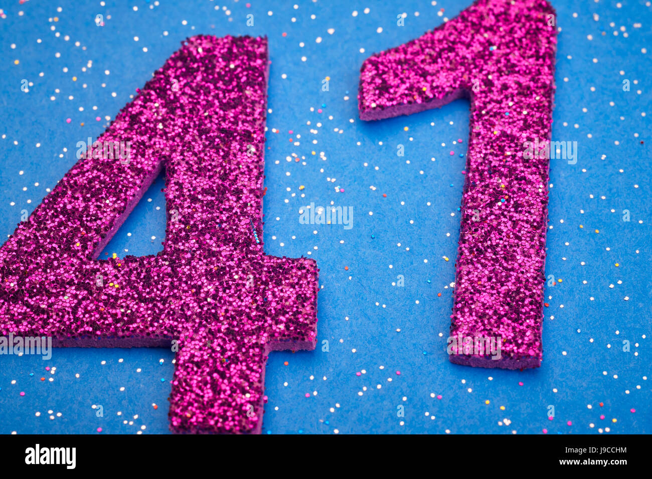 Number fortyone purple color over a blue background. Anniversary ...
