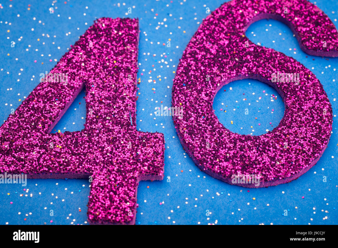 Number fortysix purple color over a blue background. Anniversary ...