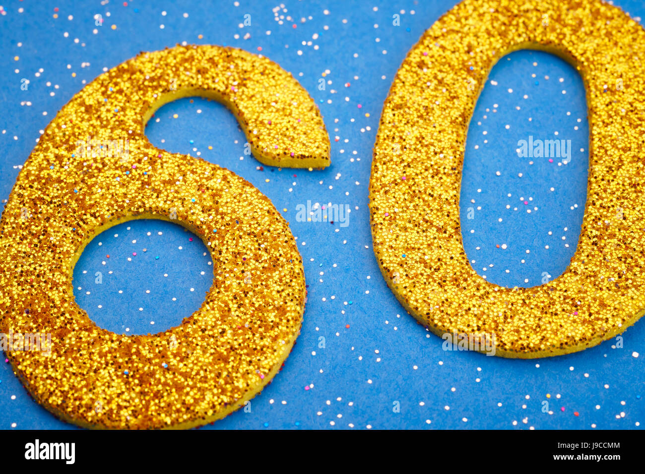 Number sixty yellow color over a blue background. Anniversary ...
