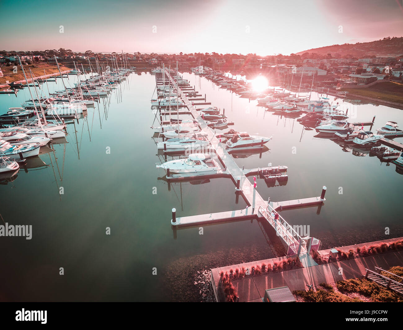 Aerial view of boats moored at Safety Beach Marina at sunset. Melbourne ...