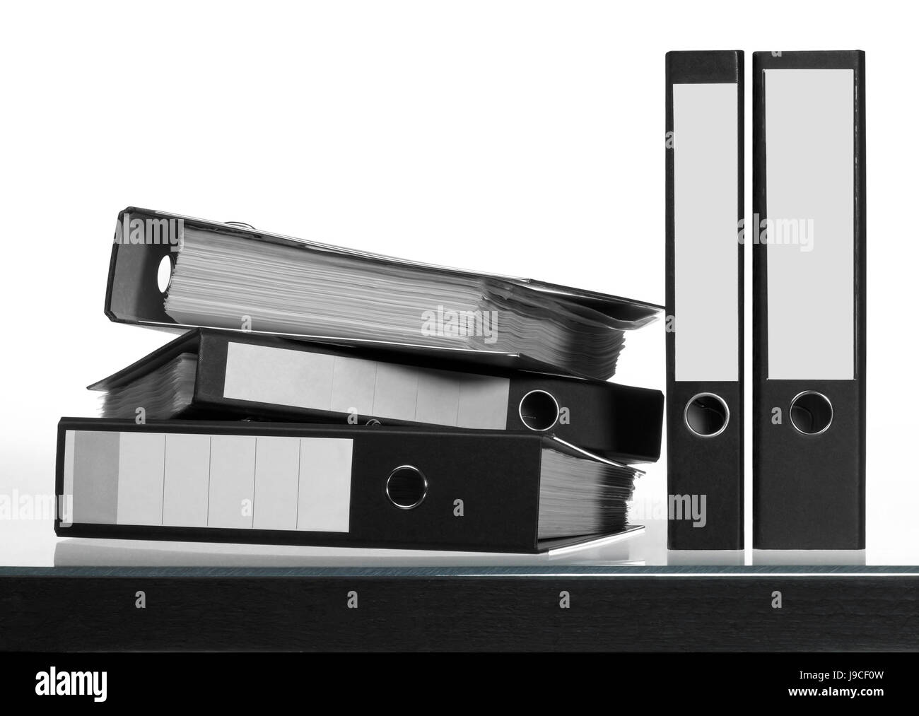 folders on desk surface Stock Photo - Alamy