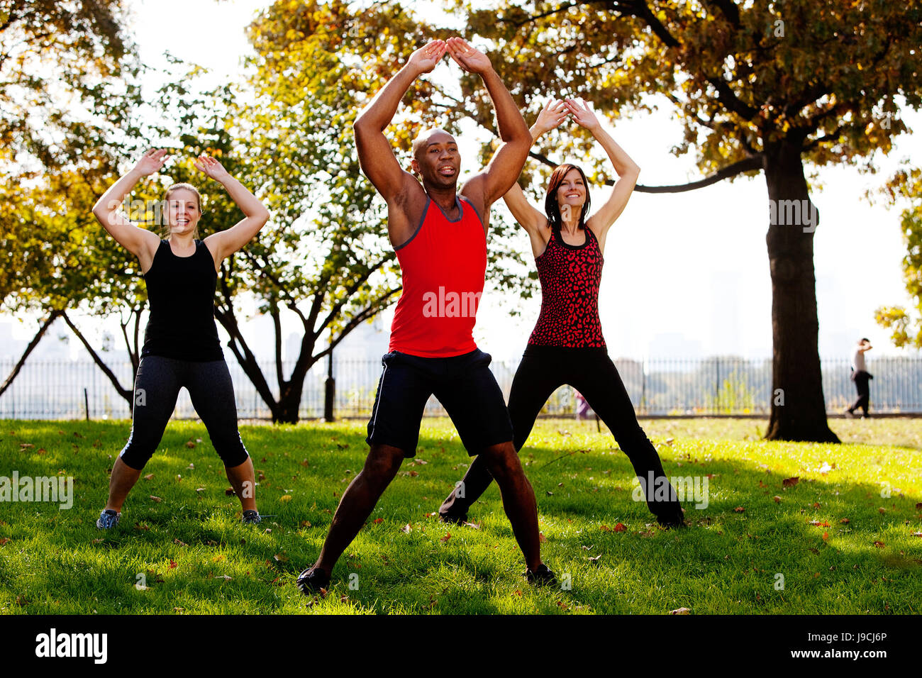Young woman bouncing up down hi-res stock photography and images - Alamy