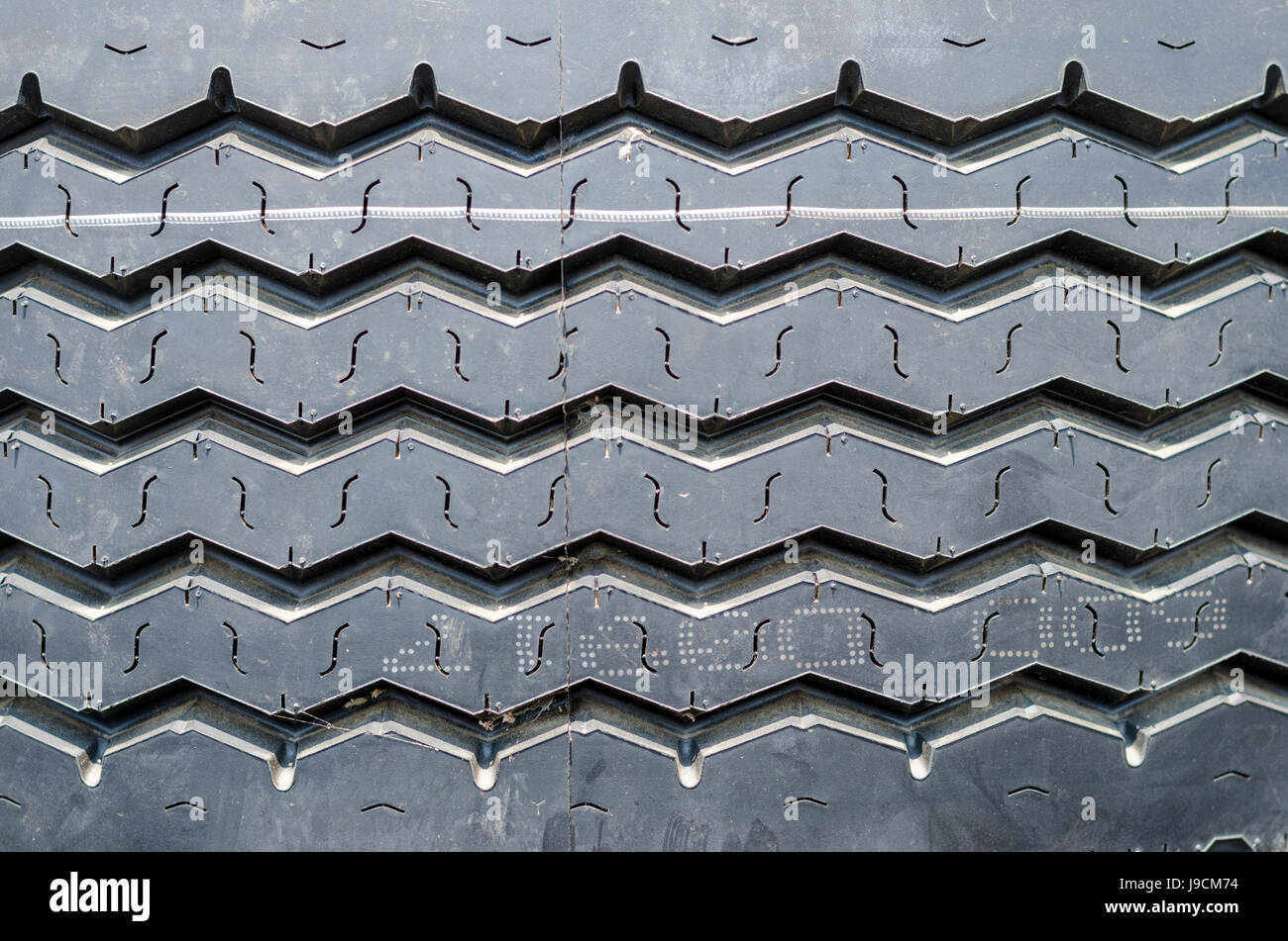 Textured pattern of a new truck tire background Stock Photo - Alamy
