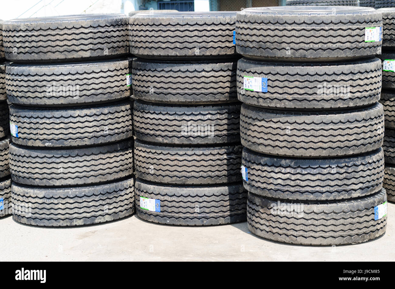 New truck tires stack up Stock Photo - Alamy