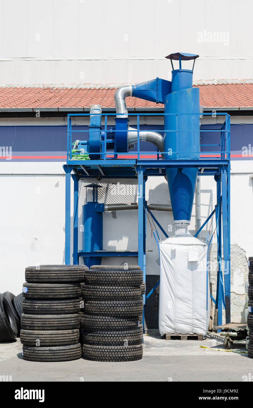 industrial dust collector of truck tire retread factory Stock Photo - Alamy