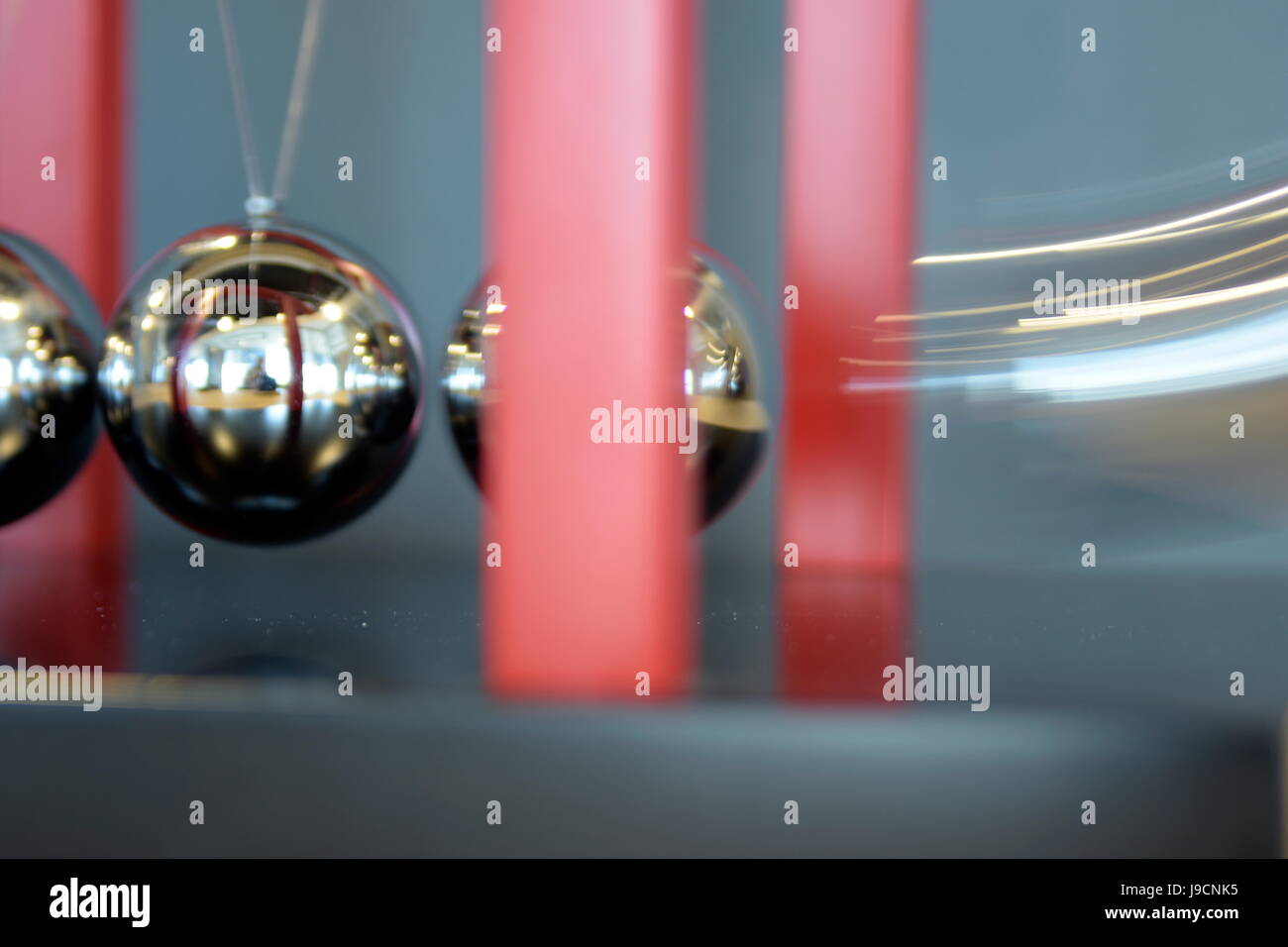 Close-up 5 Balls Pendulum, Newton's cradle, in different angels Stock ...