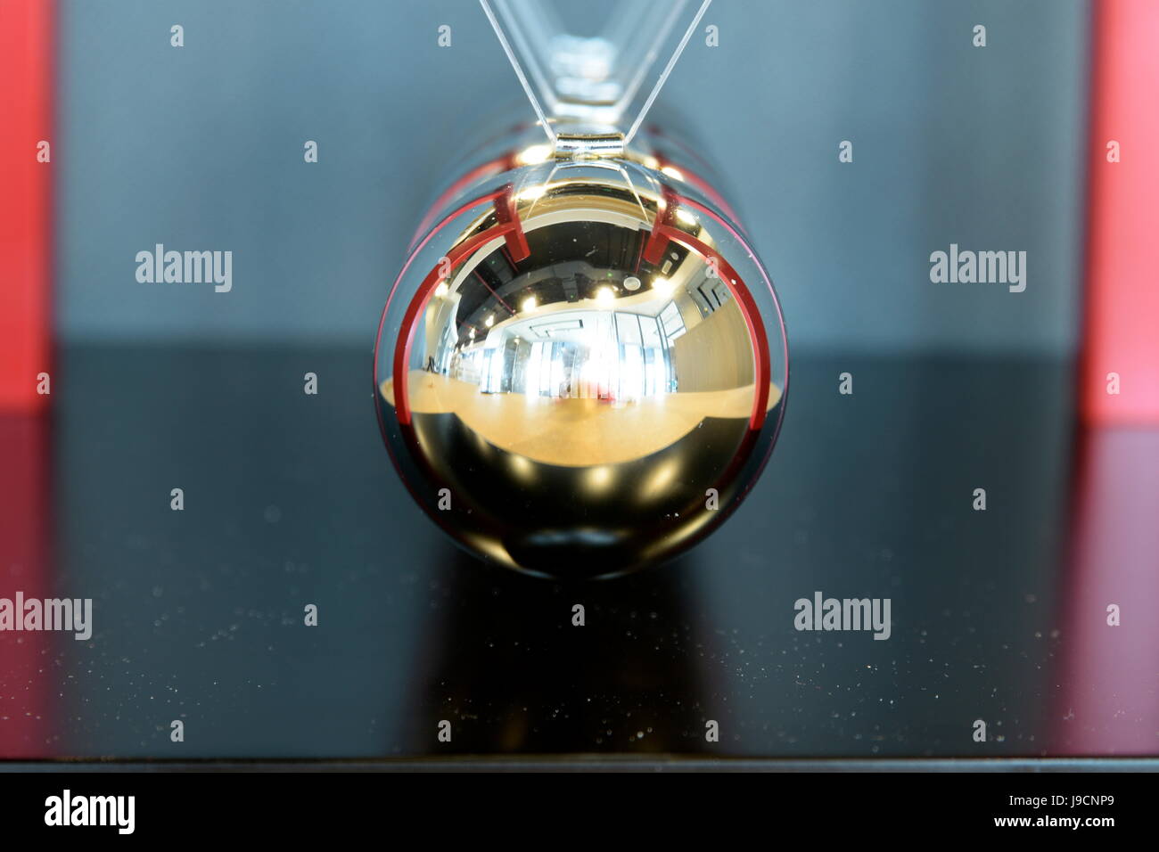 Close-up 5 Balls Pendulum, Newton's cradle, in different angels Stock ...