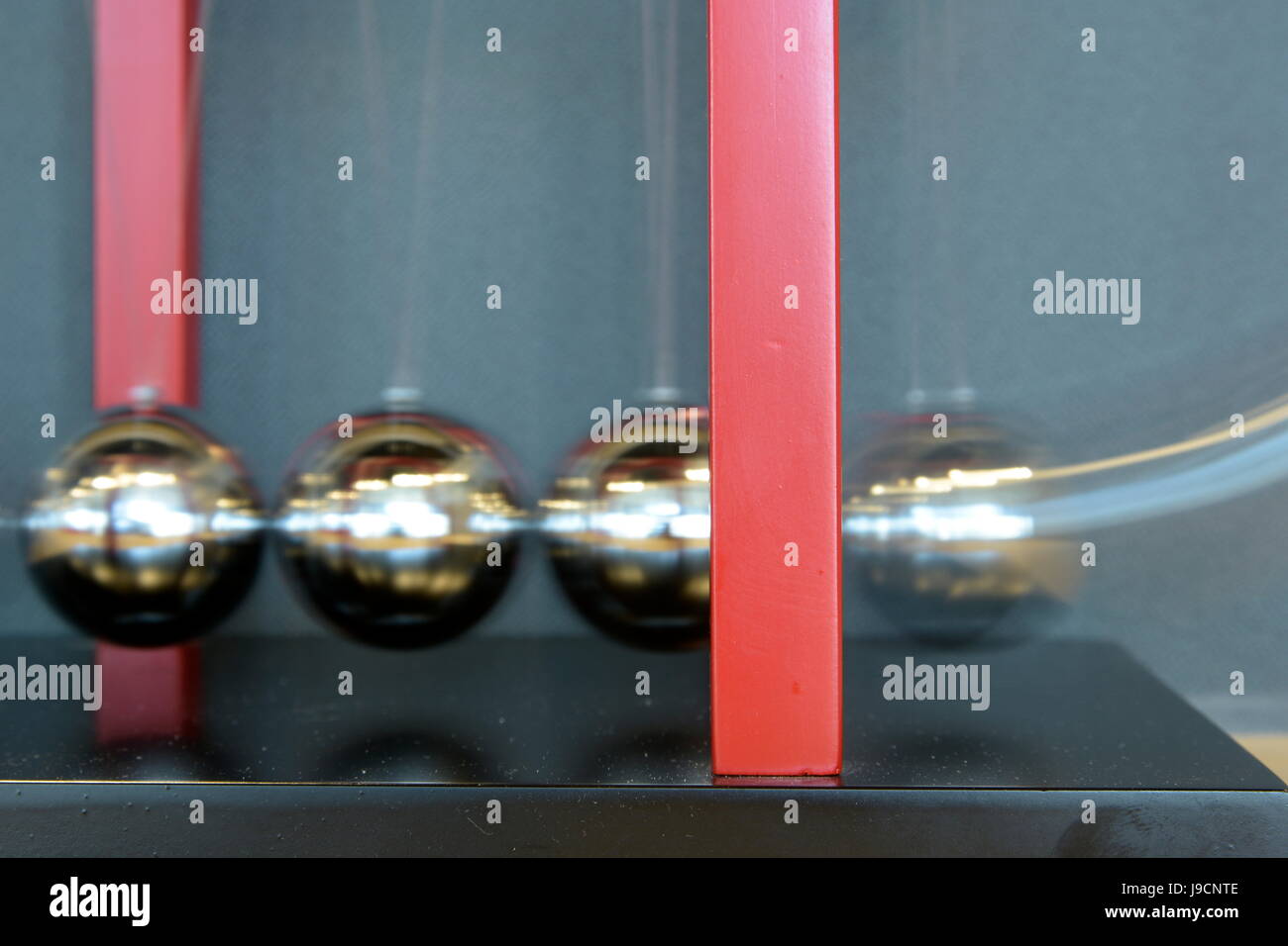 Close-up 5 Balls Pendulum, Newton's cradle, in different angels Stock ...