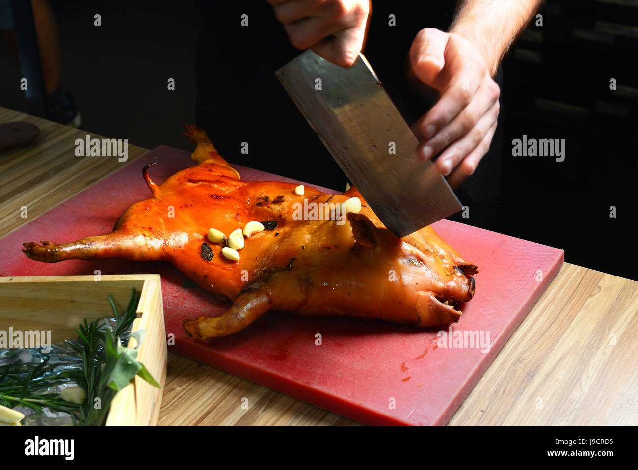 chef preparing roast piglet Stock Photo - Alamy