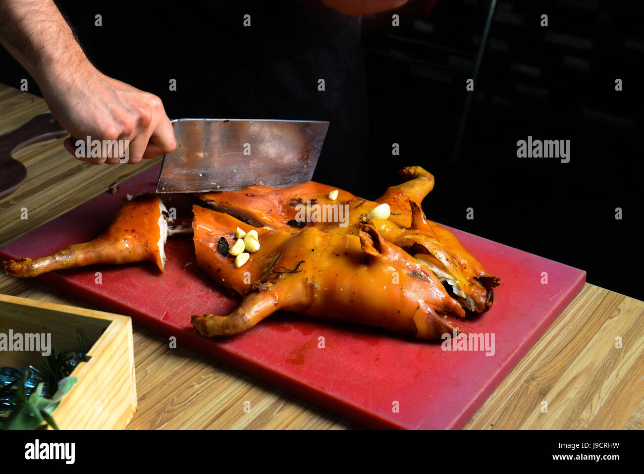 Chef preparing roast piglet hi-res stock photography and images - Alamy