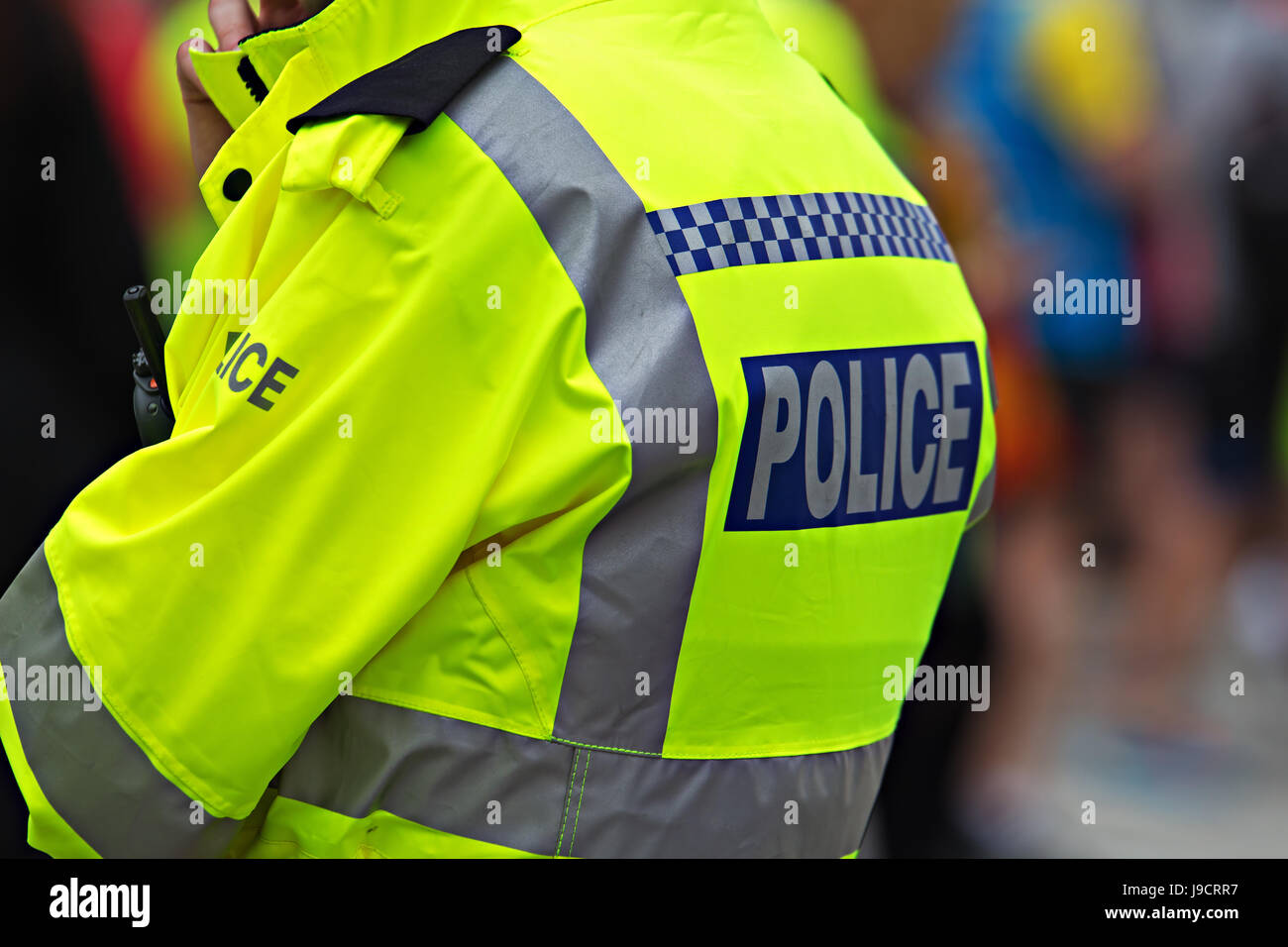 British Police Officers in high visibility uniform on crowd control ...
